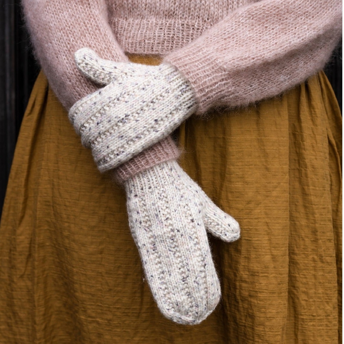 Neulo lapaset, joissa on rikottu joustinneulevarsi